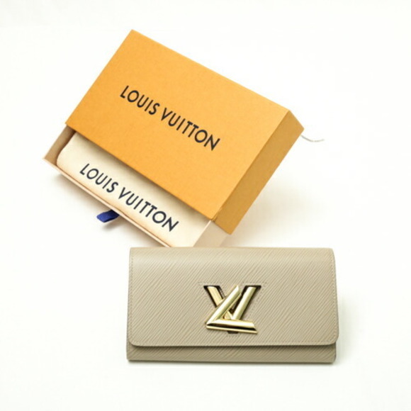 Louis Vuitton | Bags | Louis Vuitton Portefeuille Twist Epi Wallet Lock ...
